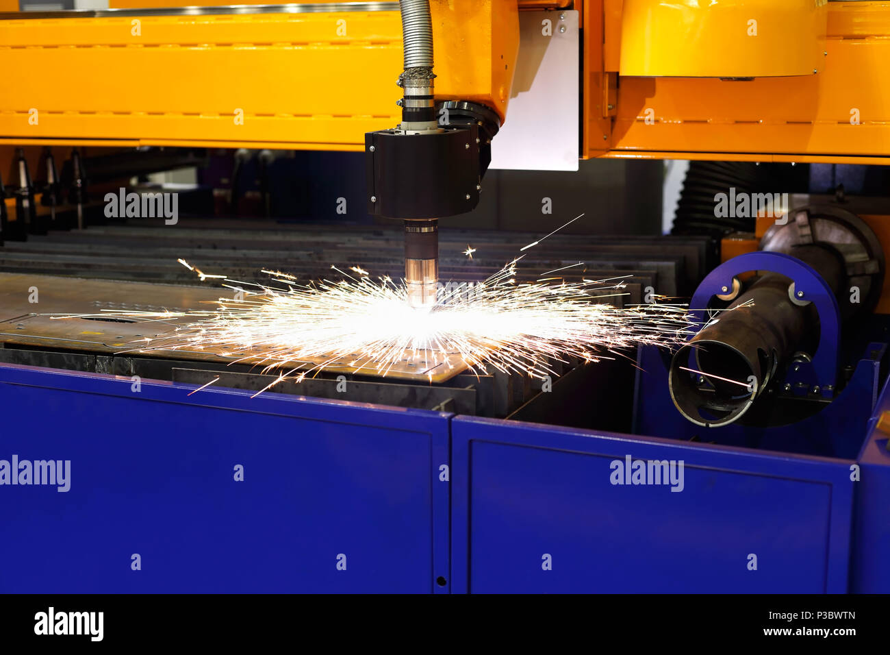 Metal cutting with a CNC table plasma cutting machine Stock Photo - Alamy