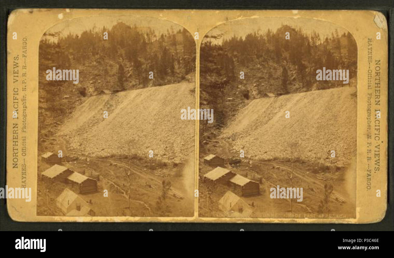 Mullen tunnel grade east approach showing log cabin hi-res stock ...