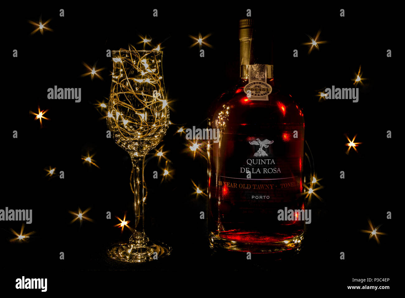 Full Port Bottle and Port Glass Surrounded by Fairy Lights Stock Photo ...