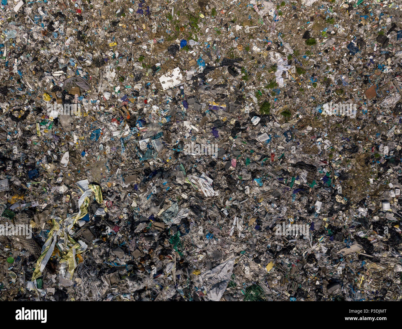 Aerial view of a very big dump with a lot of waste and garbage in the ...