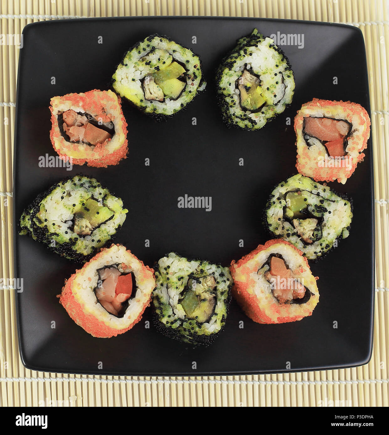 Sushi Set - different types of Maki sushi and chopsticks on a b Stock ...