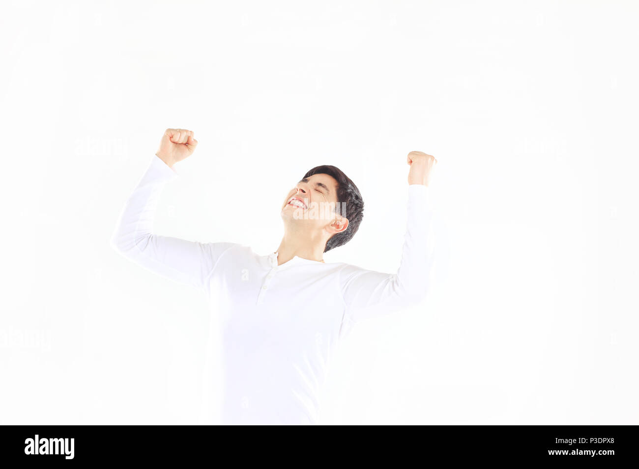 concept of victory: the triumphant businessman on white background ...