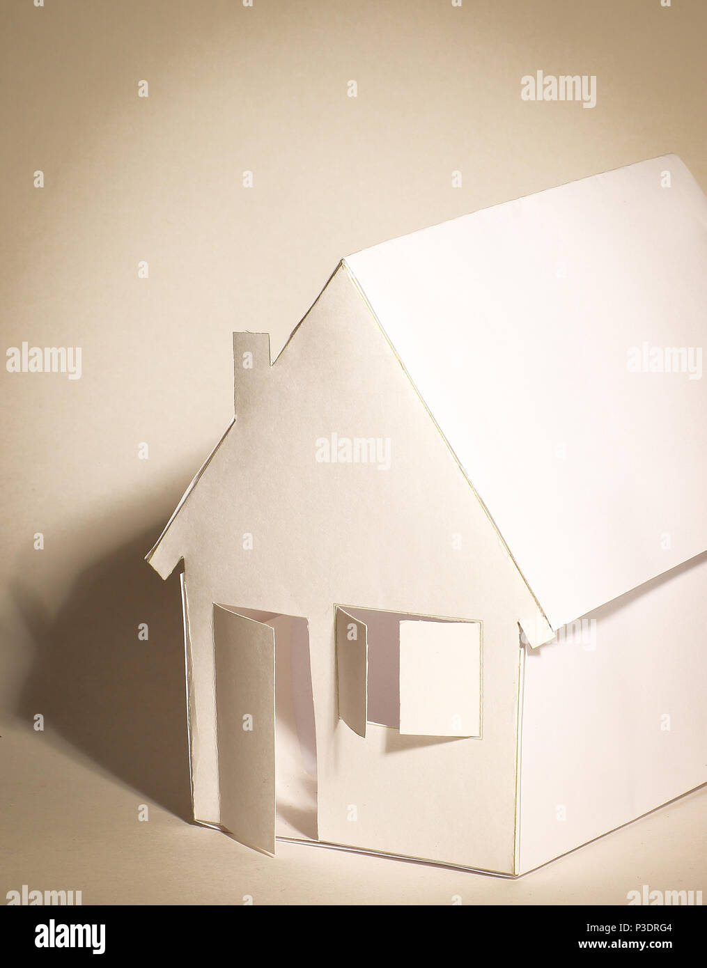 paper house paper background.the concept of a mortgage Stock Photo - Alamy