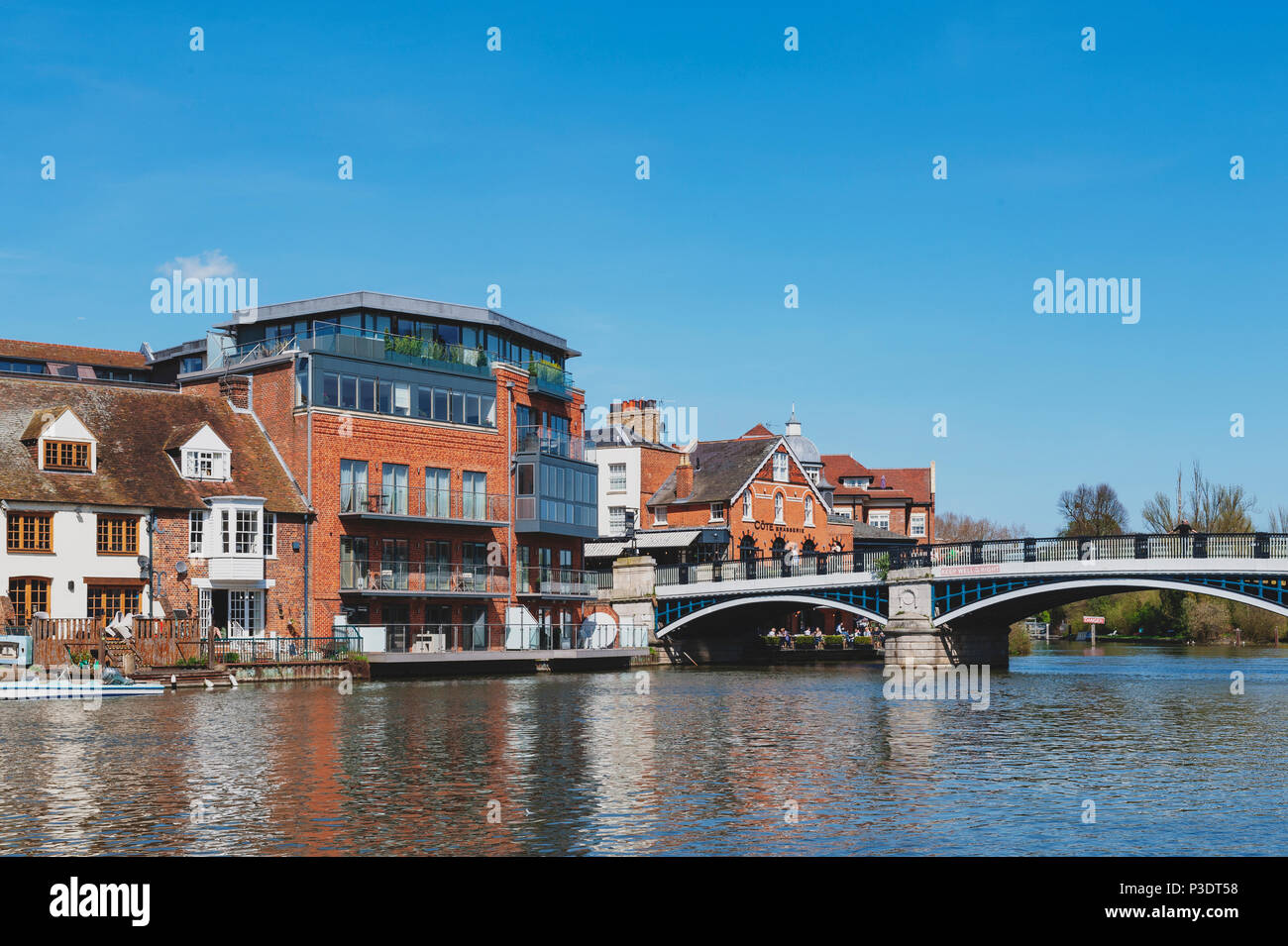 The River Thames flowing through Windsor and Eton, twin towns, in ...