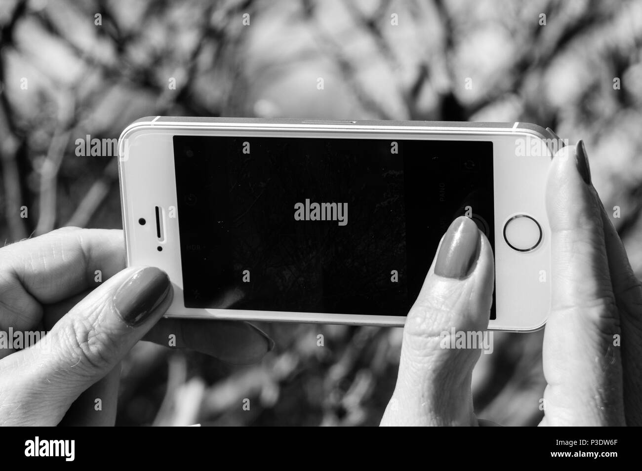 Hand phone tablet Black and White Stock Photos & Images - Alamy