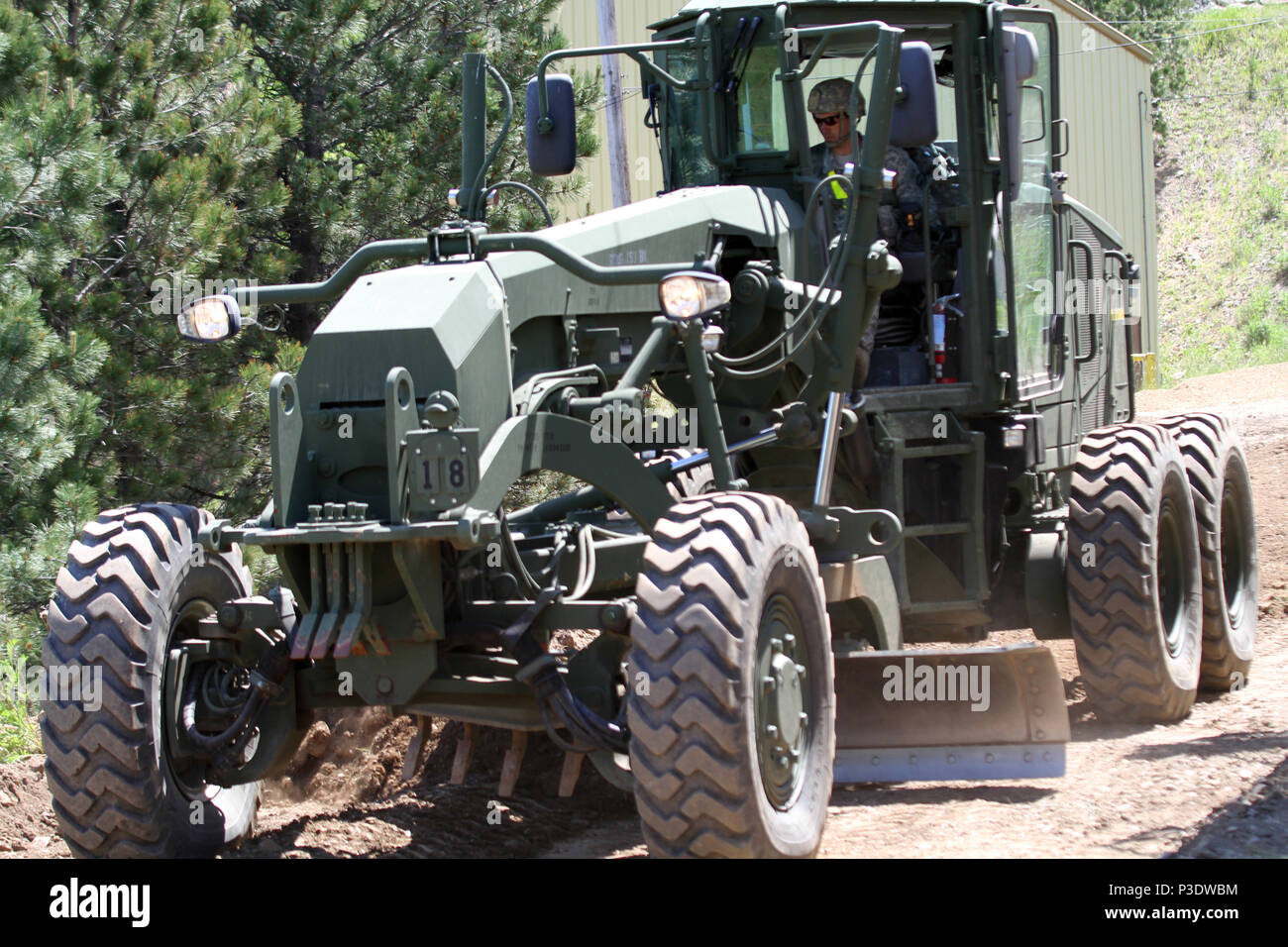 U.S. Army Sgt. Jon Edwards with the South Dakota Army National Guard’s ...