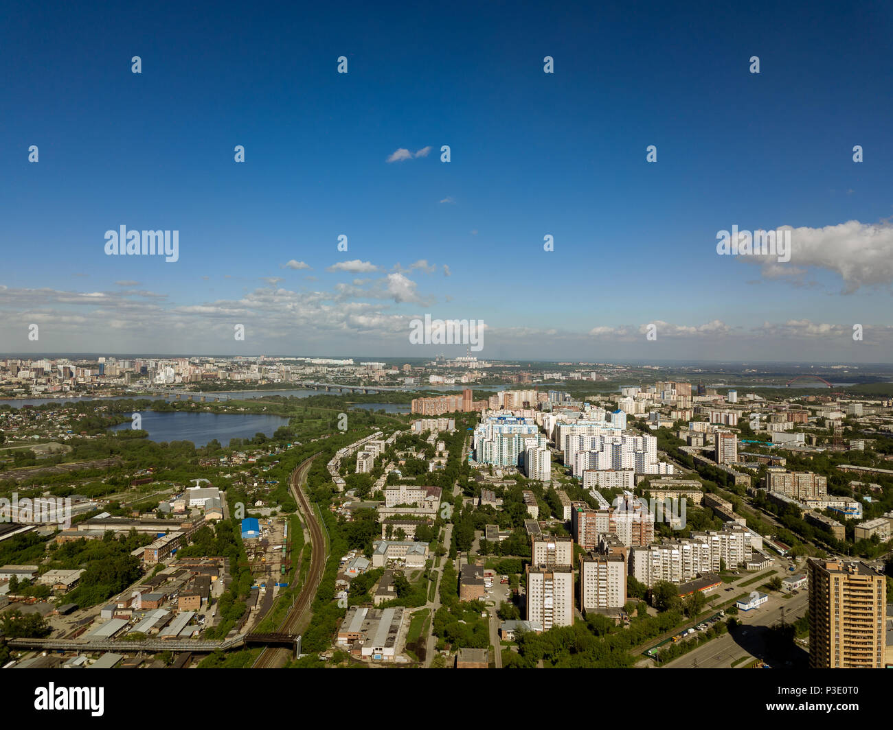 Aerial view of old and new russian buildings with lake and blue sky in ...