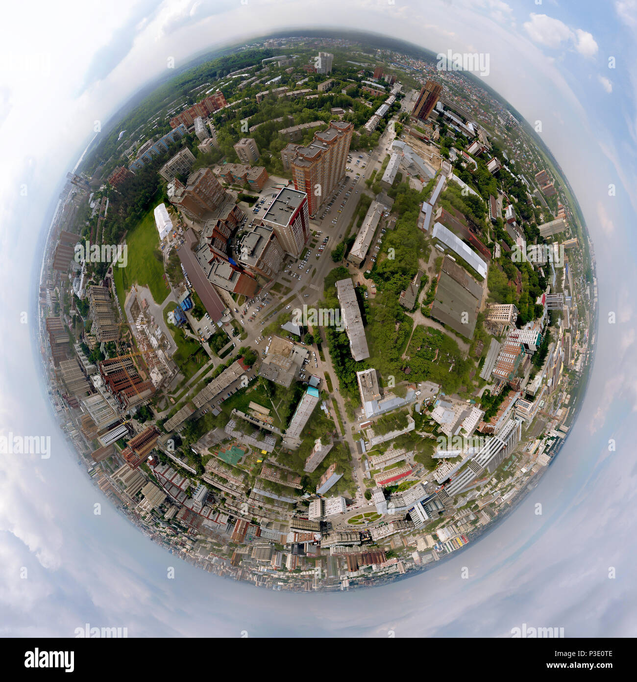 Aerial view of old and new russian buildings in green area in the city ...