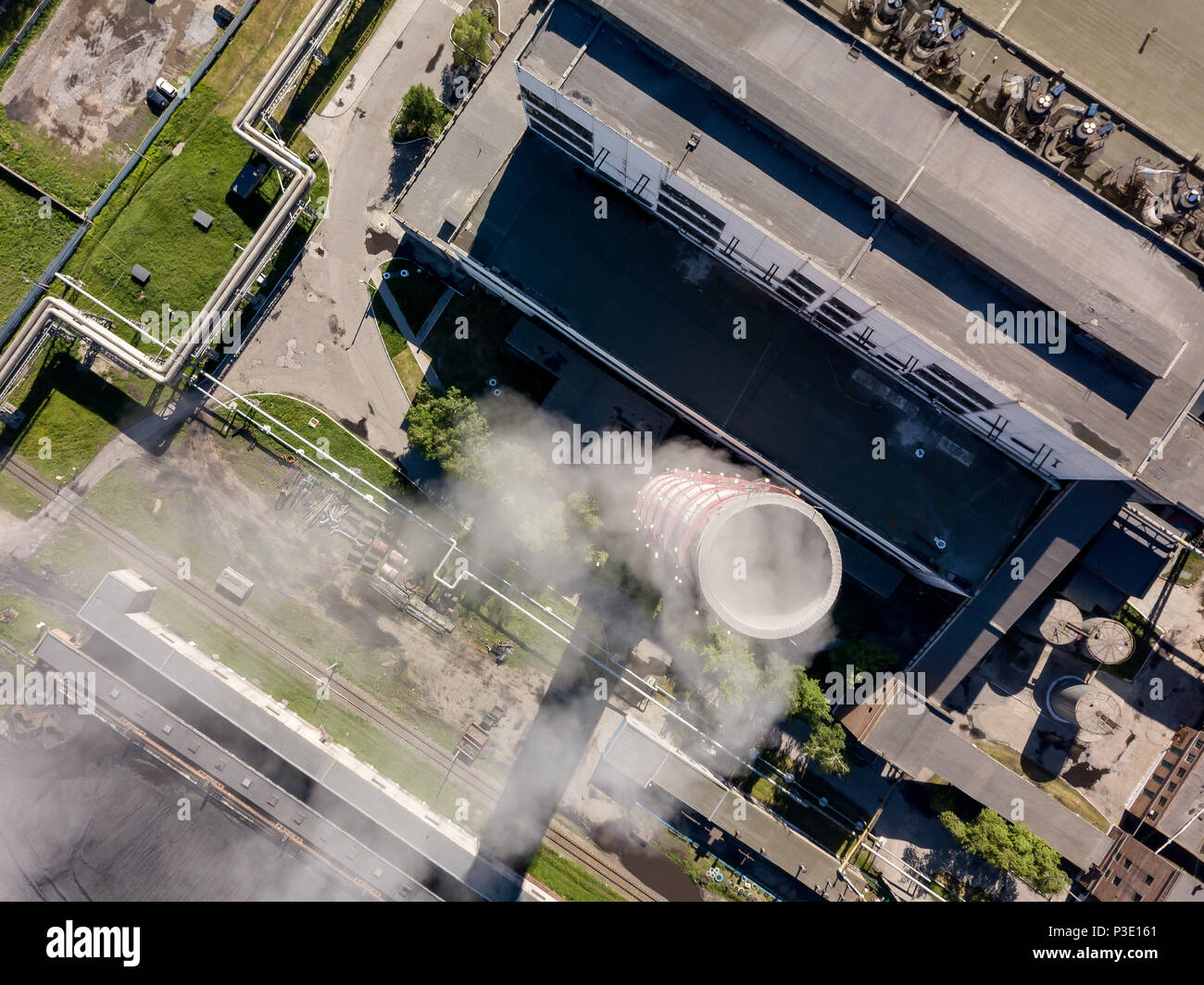 Aerial view of the one pipe from the plant from which the smoke is ...