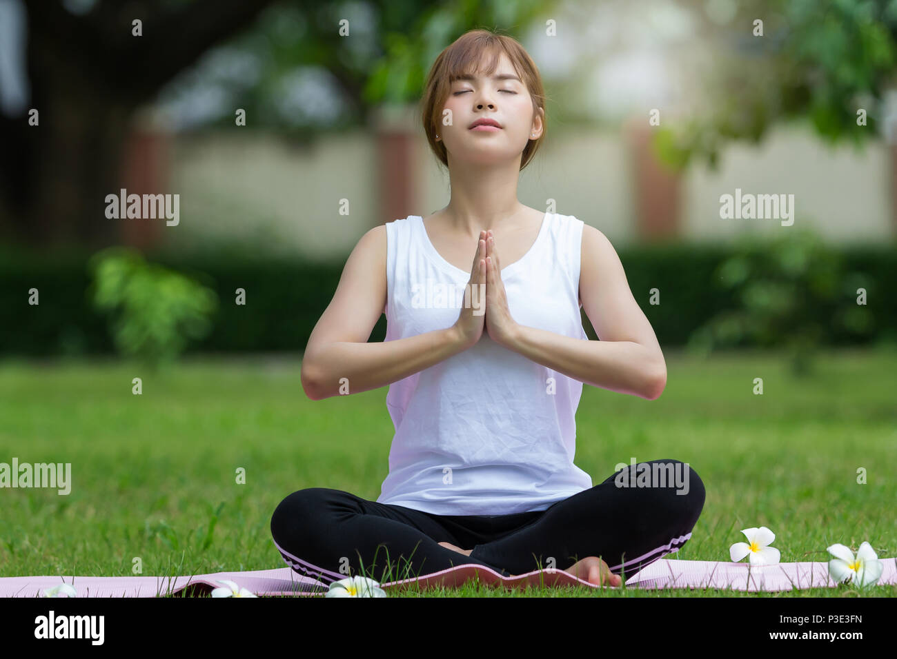 Beautiful asian women doing yoga hi-res stock photography and images ...