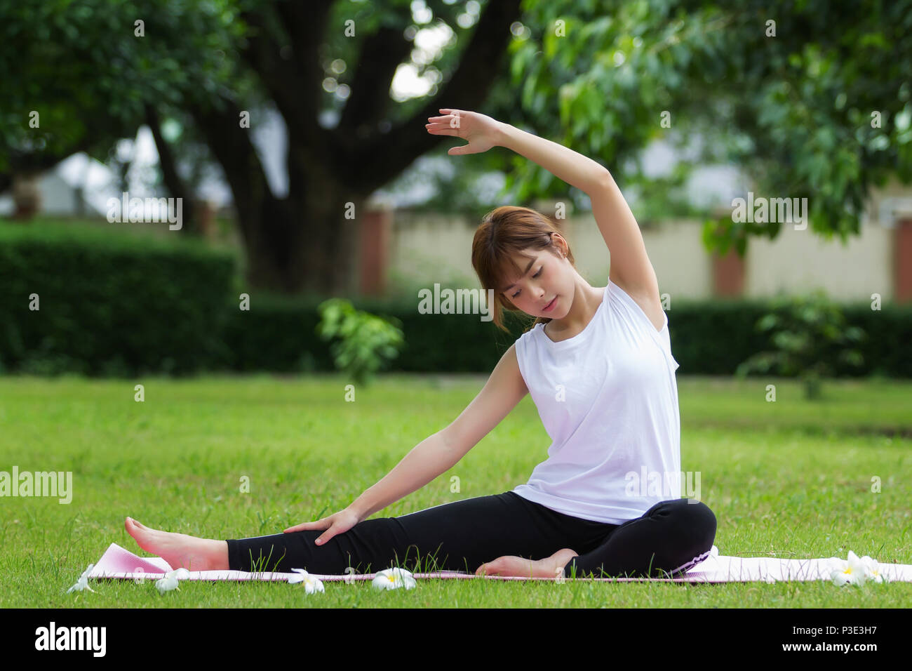 Beautiful asian women doing yoga hi-res stock photography and images ...