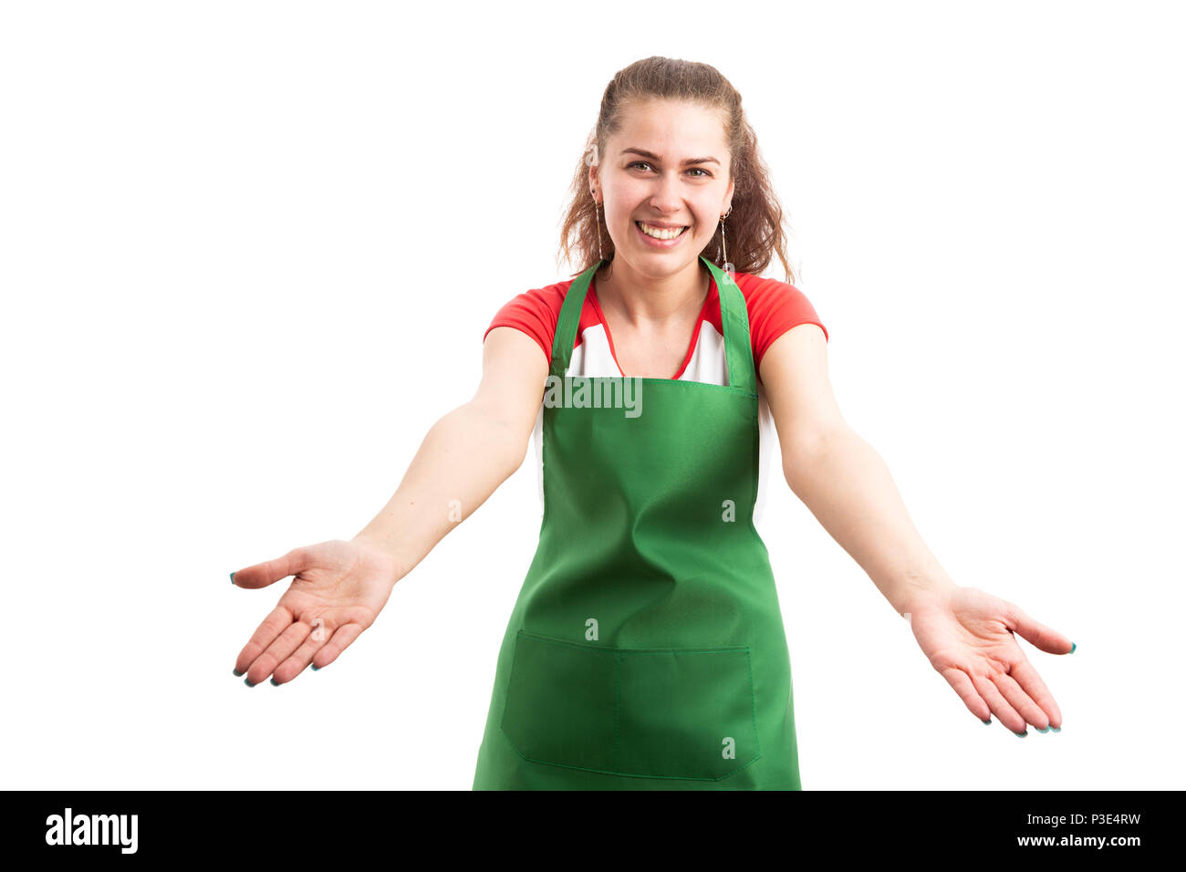 Young woman retail or supermarket worker making welcome gesture with ...
