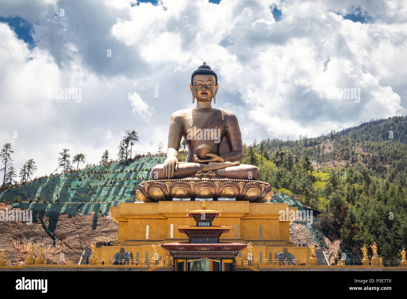 169 feet tall bronze Buddha statue shining bright in the daytime from ...