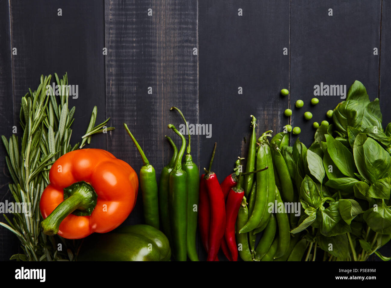 Healthy food background with fresh vegetables and hearbs on wooden ...