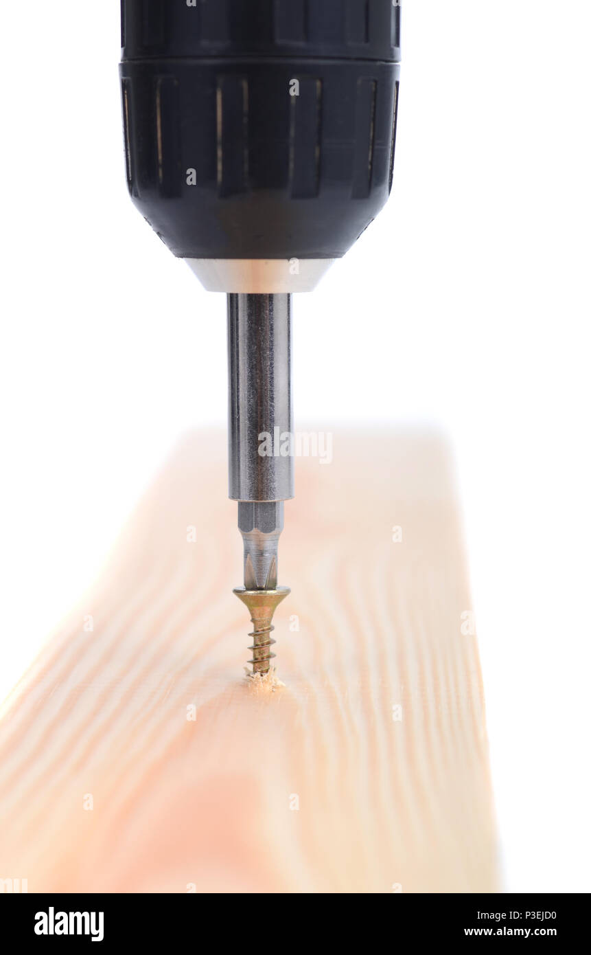 Wood Screw being screwed into a wood , Carpenter woodwork, screwing ...