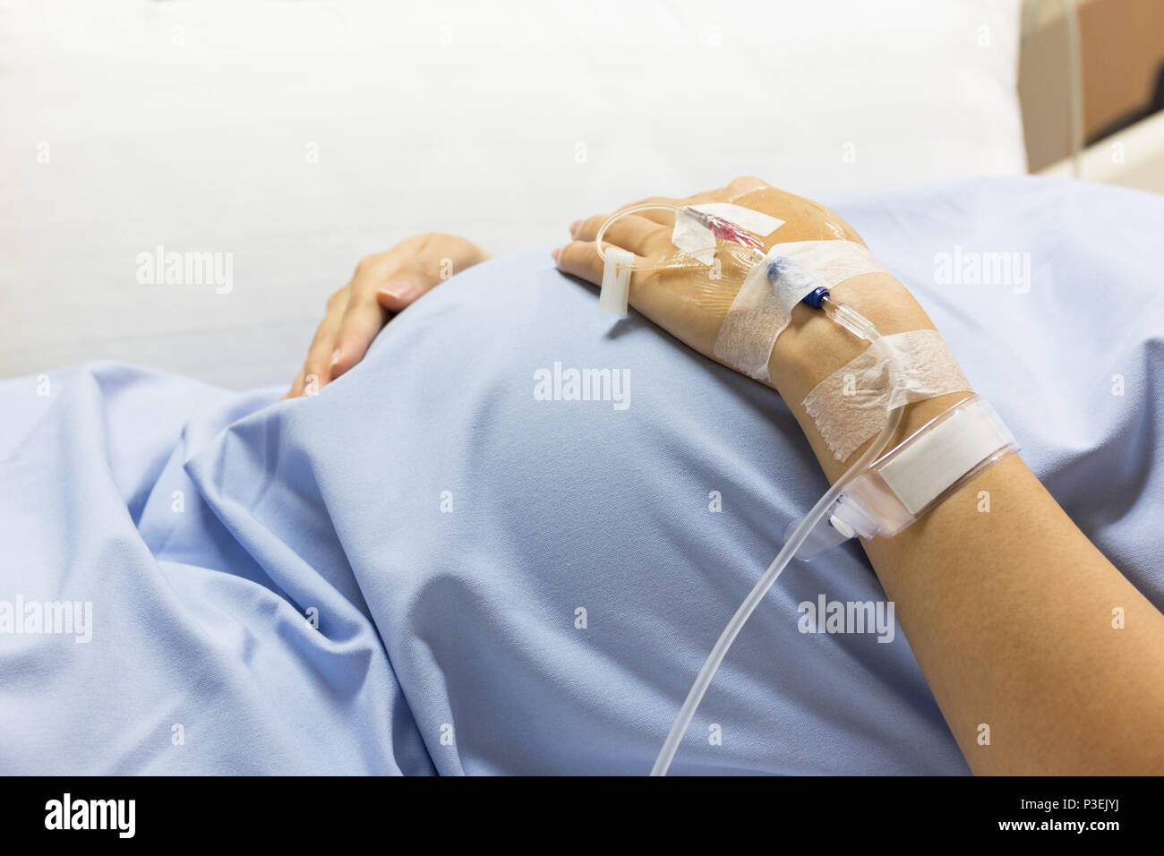 Intravenous drip arm pregnant woman hi-res stock photography and images ...