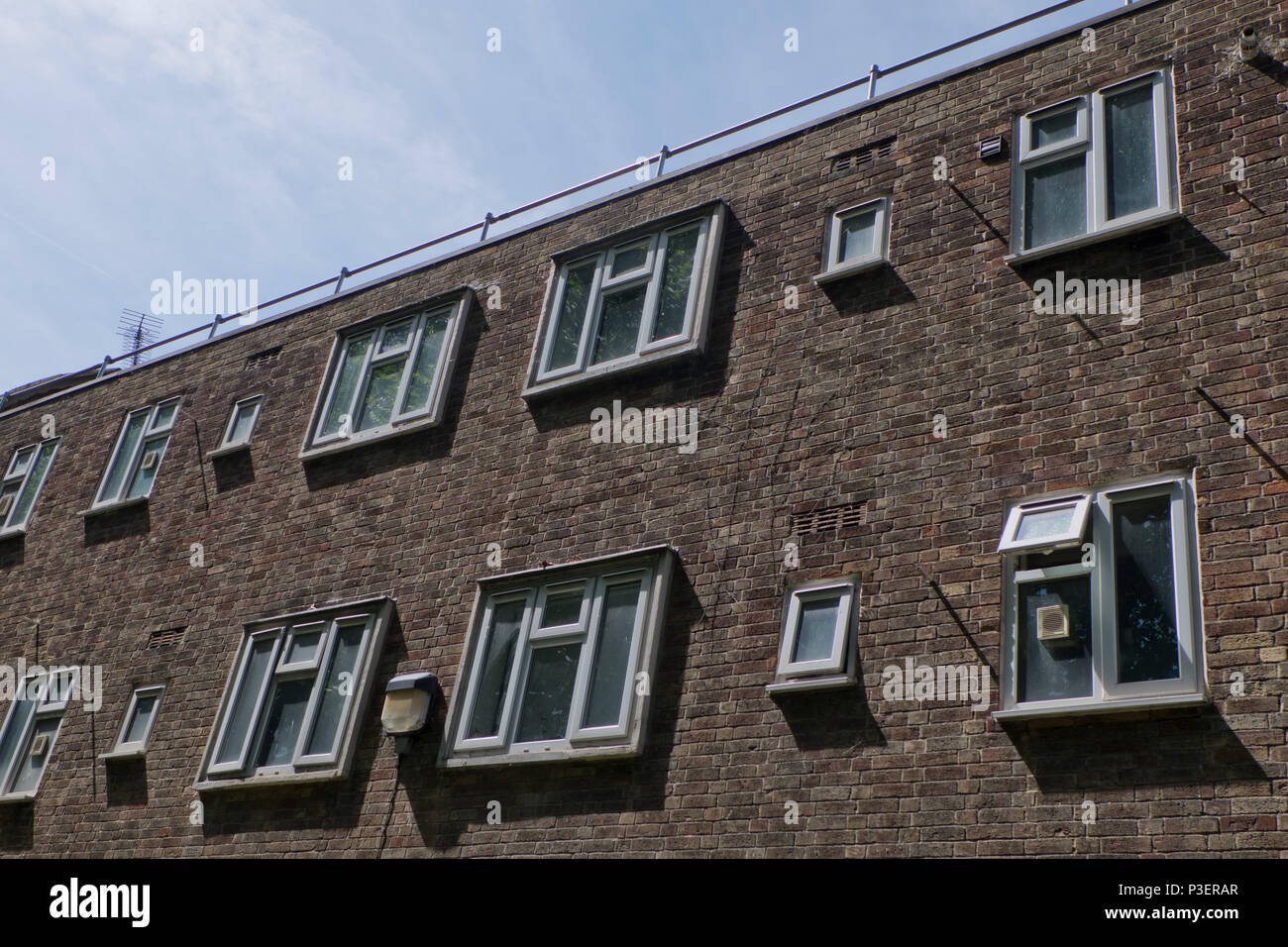 Run-down social housing estate fitted with plastic uPVC windows in ...