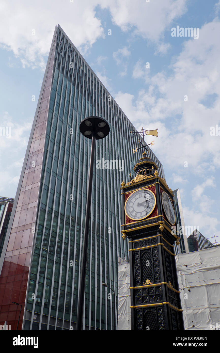 Restored old 'Little Ben' clock tower by Victoria Theatre and new ...
