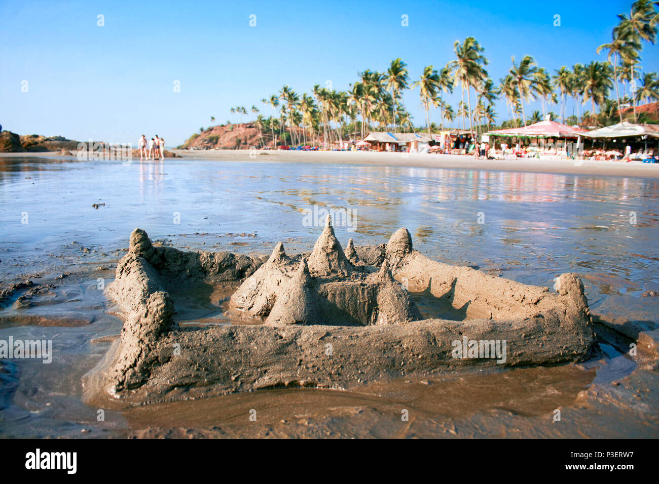 Sand castel on beautiful tropical Vagator beach, Goa, India Stock Photo ...