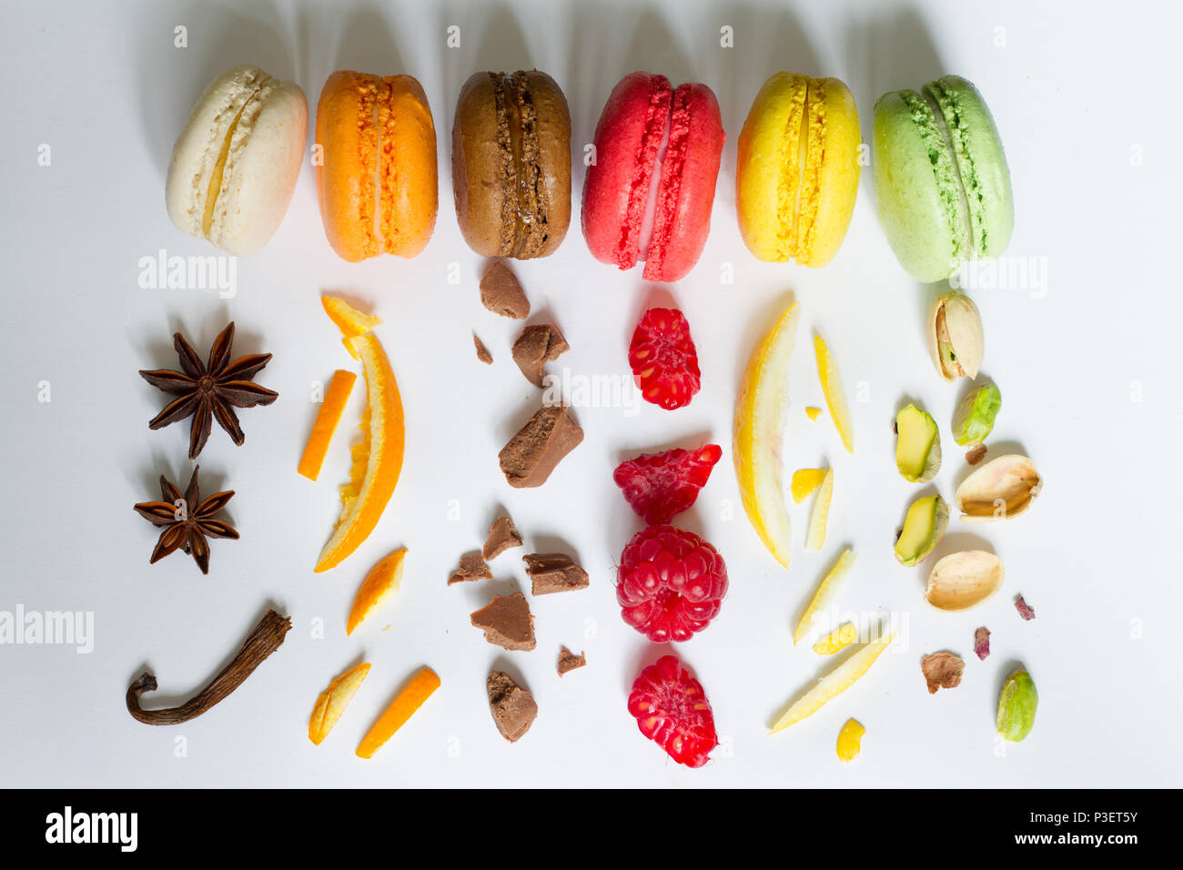 Colorful french macarons abstract still life with fruits and ...