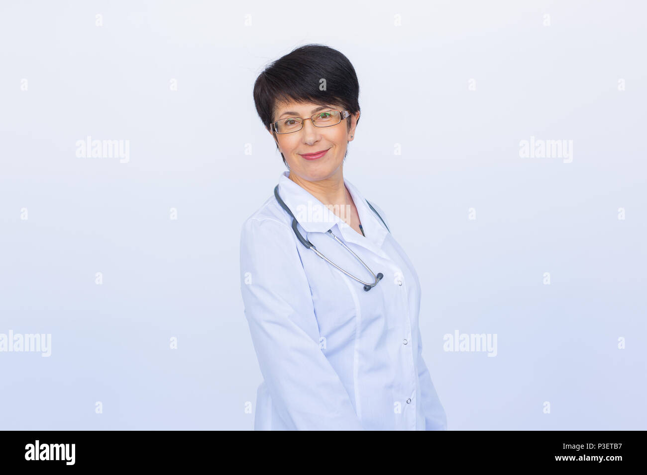 Doctor woman smile face with stethoscope over white background Stock ...