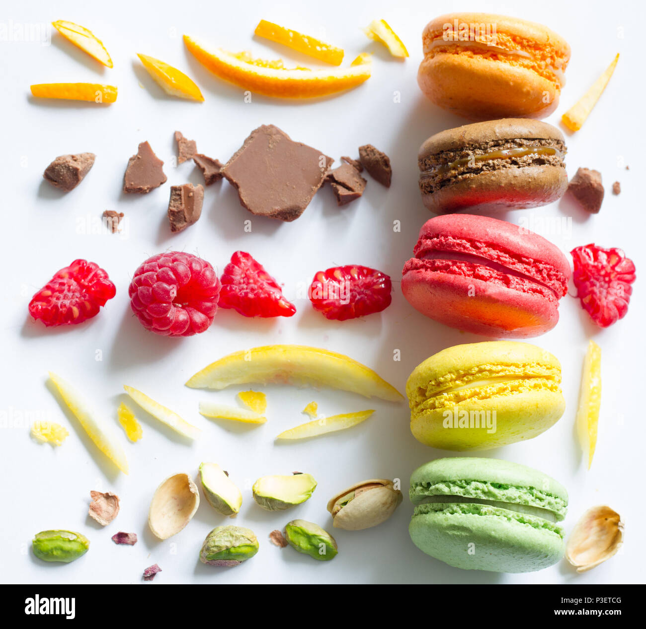 Colorful french macarons abstract still life with fruits and ...