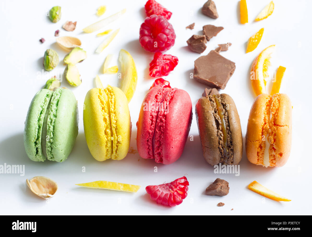 Colorful french macarons abstract still life with fruits and ...