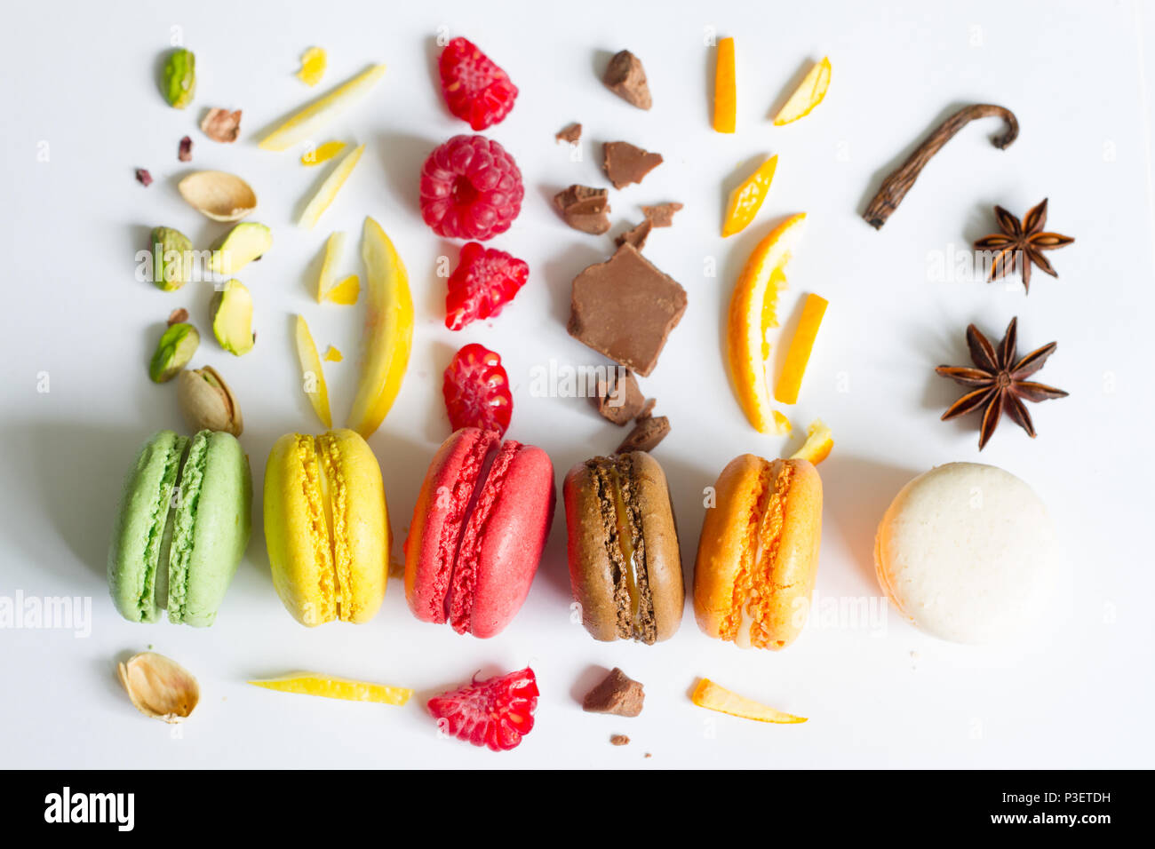 Colorful french macarons abstract still life with fruits and ...