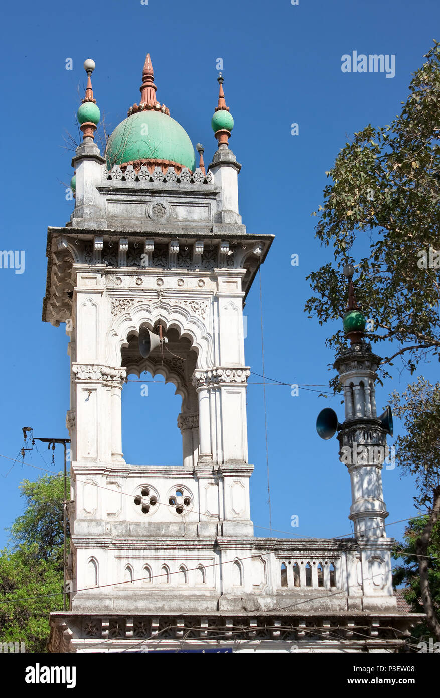 Minarets of a mosque surrounded by trees in Chandor village near Margao ...