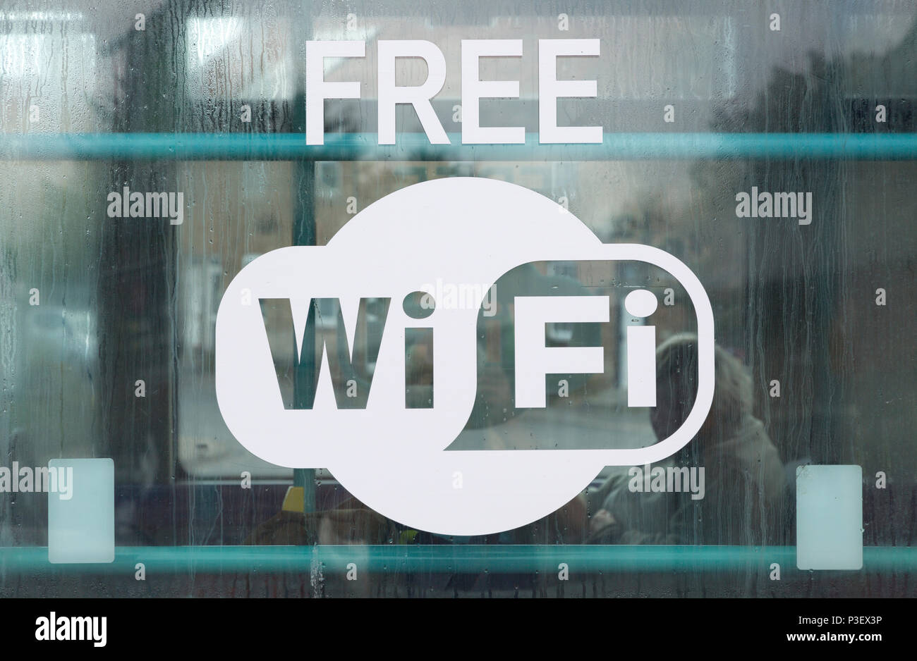 Sign for Free Wi Fi on glass window public transport bus, Suffolk ...