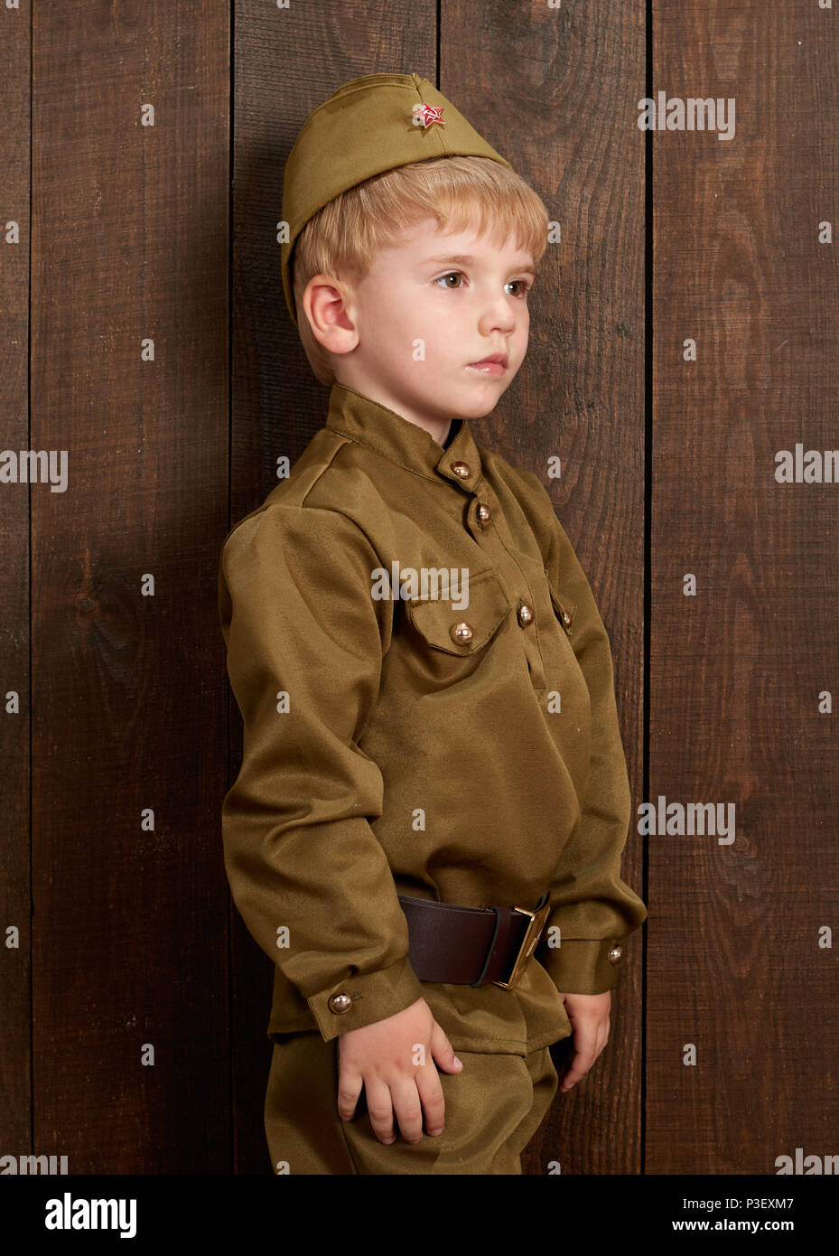 children are dressed as soldier in retro military uniforms Stock Photo ...