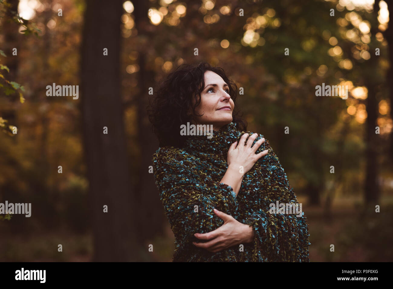 Woman standing in forest hi-res stock photography and images - Alamy