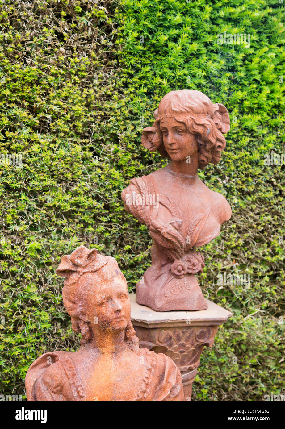 Rusted metal cast iron bust statues female figures, The Walled garden ...