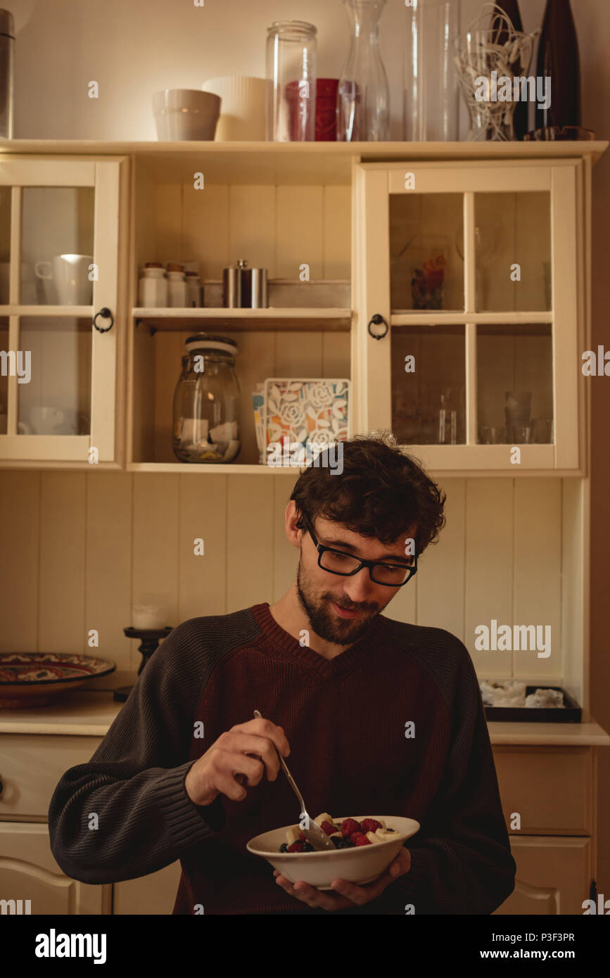 Handsome young man having breakfast hi-res stock photography and images ...