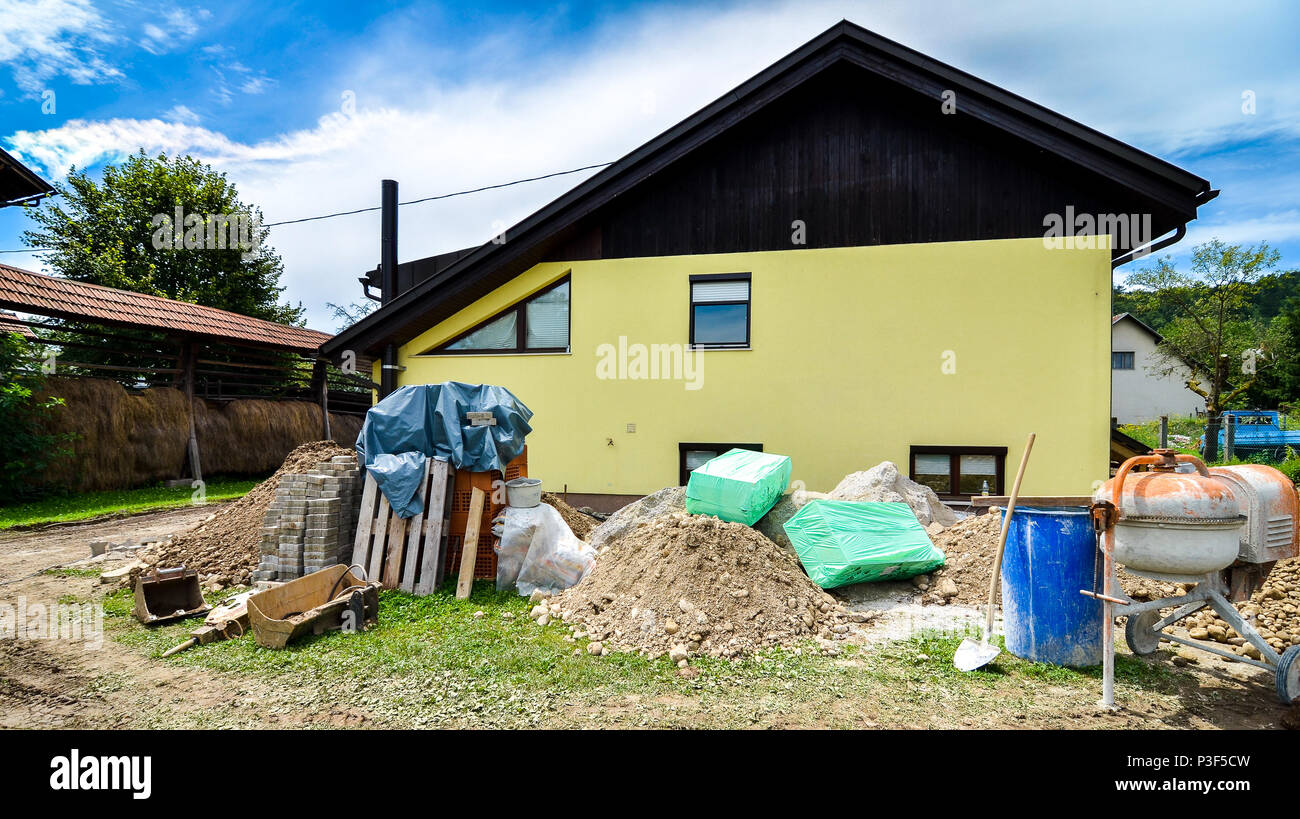 Rebuilding a family house and adding an extension. Setting up a ...