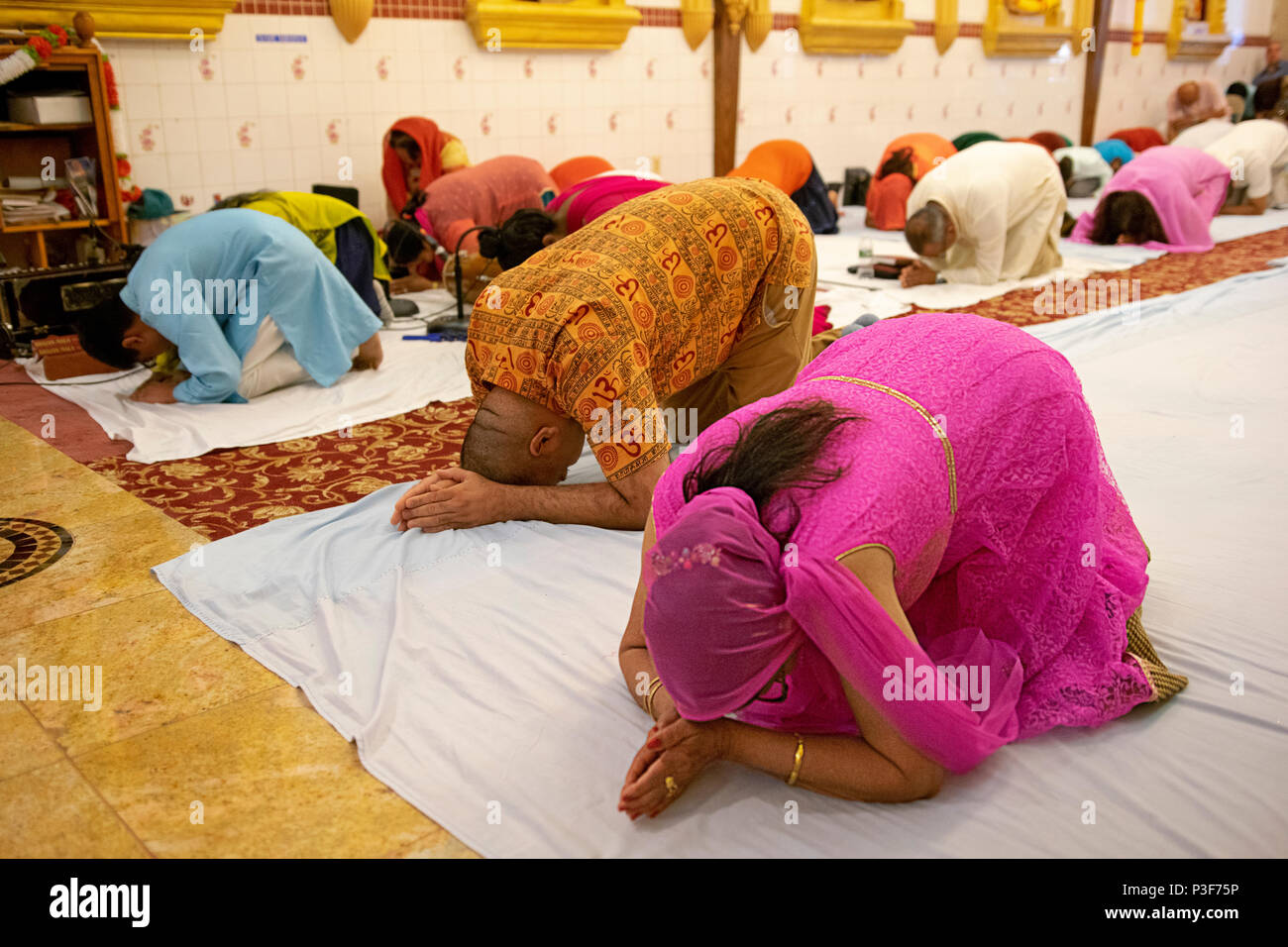 Kneeling Women High Resolution Stock Photography and Images - Alamy