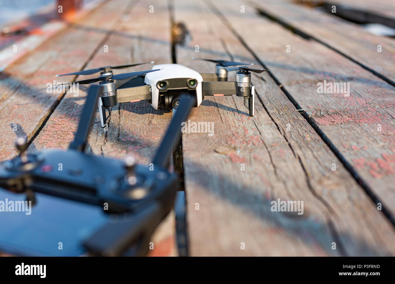 Drone and control panel on an old board Stock Photo - Alamy