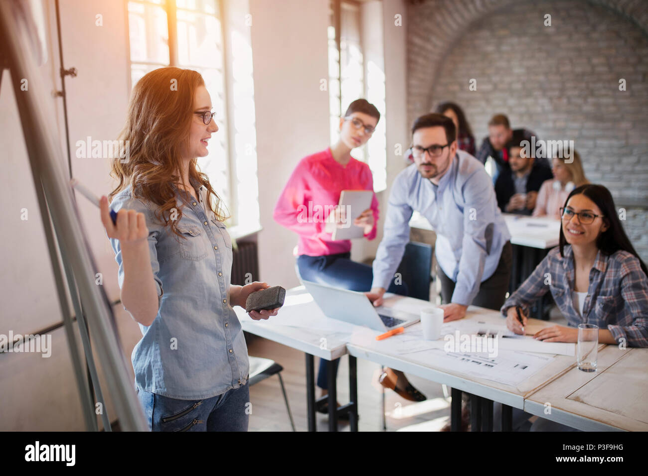 Presentation teamwork planning woman hi-res stock photography and ...