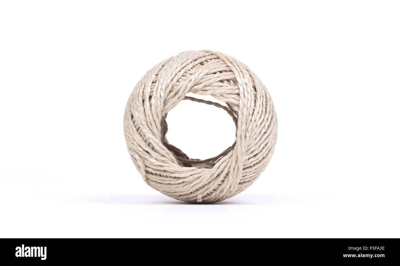 Small ball of rope isolated on a white background Stock Photo - Alamy