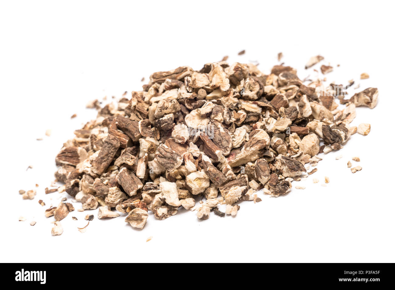 Organic dried dandelion root isolated on white background, dutch angle ...