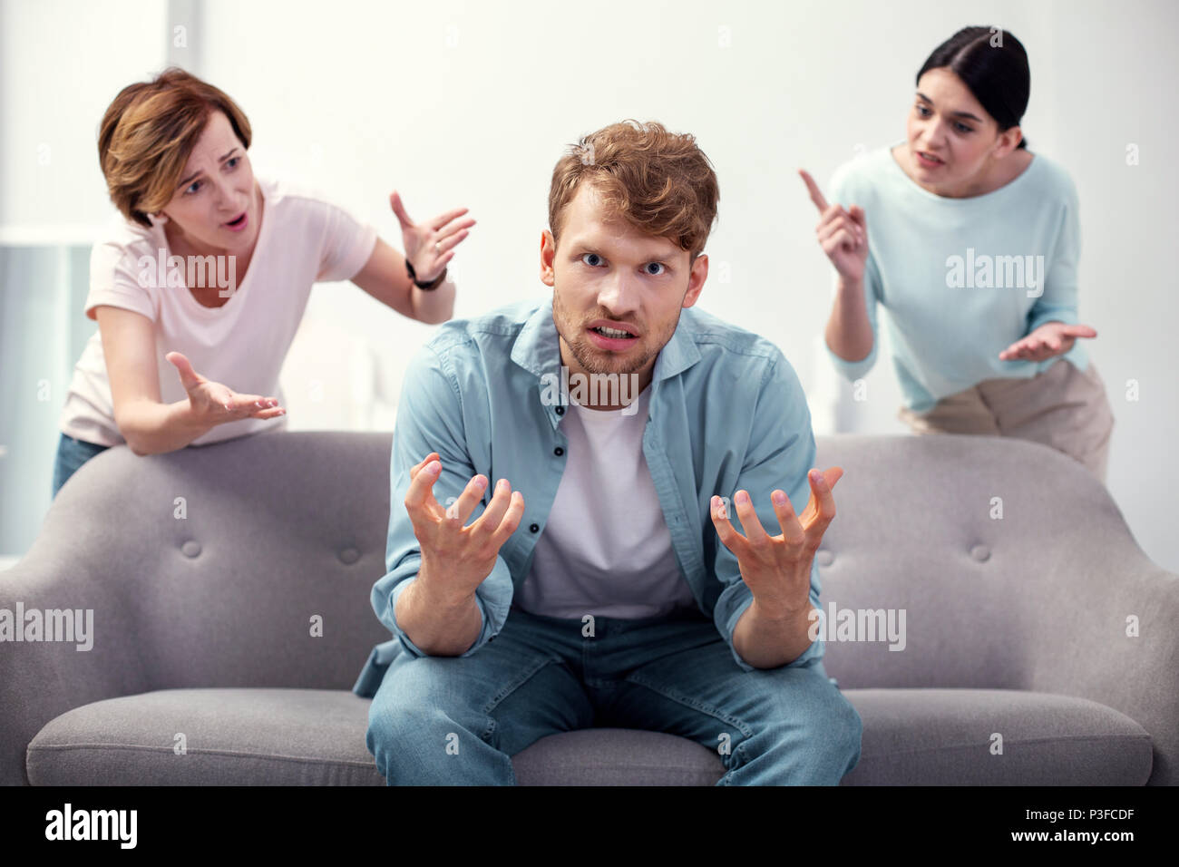 Angry young man being stressed out Stock Photo - Alamy
