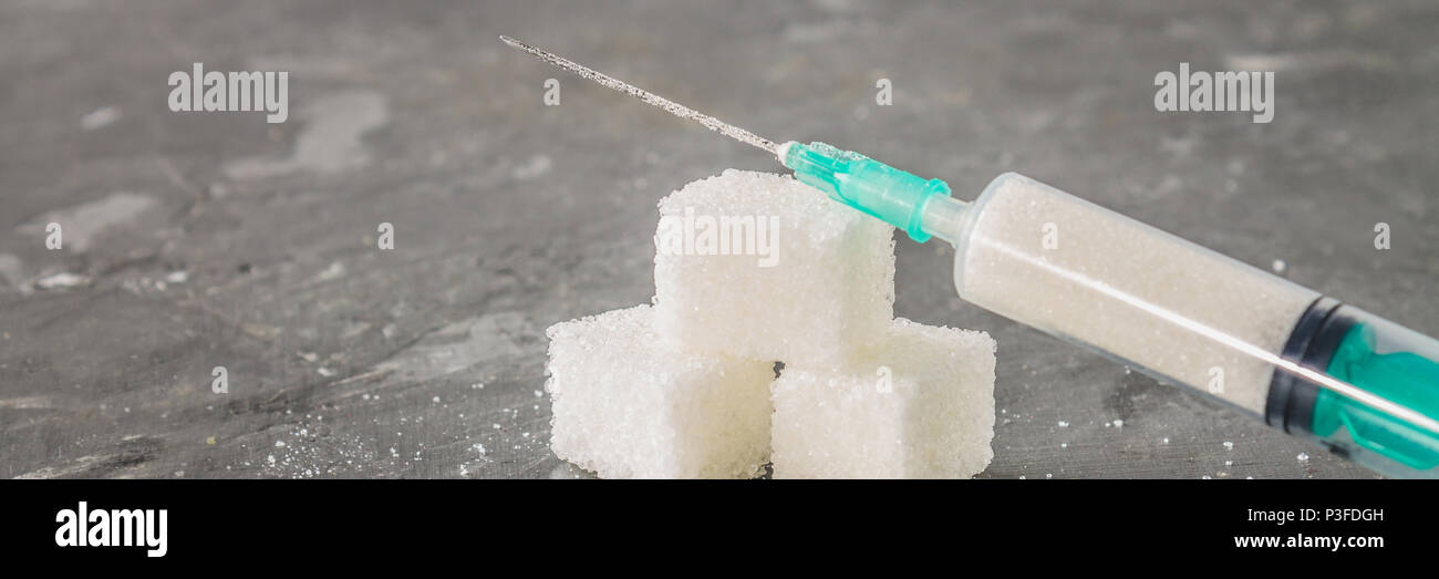 Sugar in a syringe. Conceptual depiction of dependence on the sweet ...