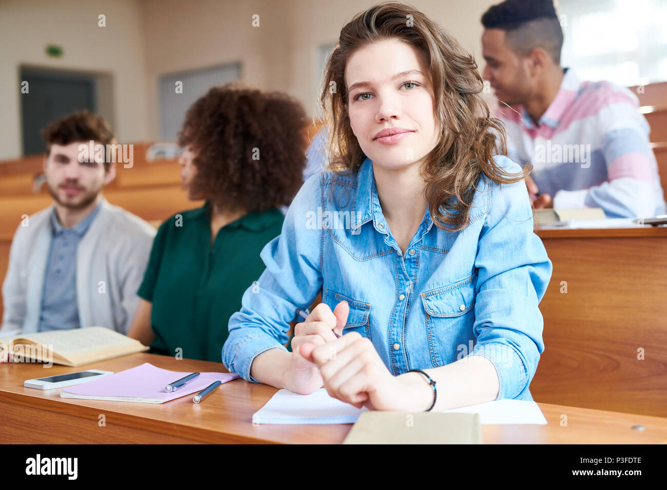 Pretty student girl at university class Stock Photo - Alamy