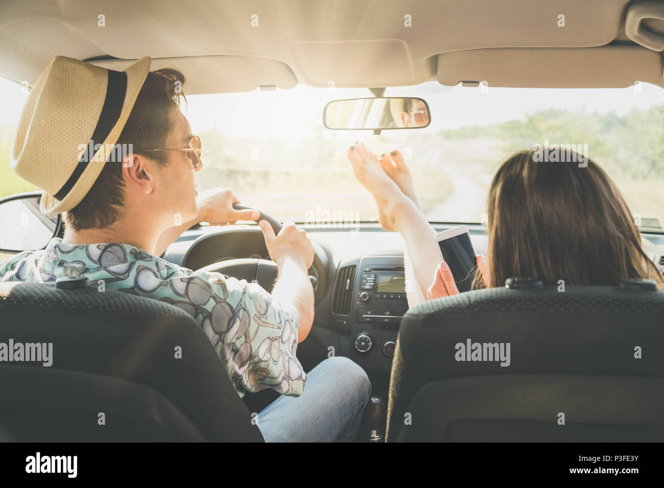 Young modern couple driving hi-res stock photography and images - Alamy