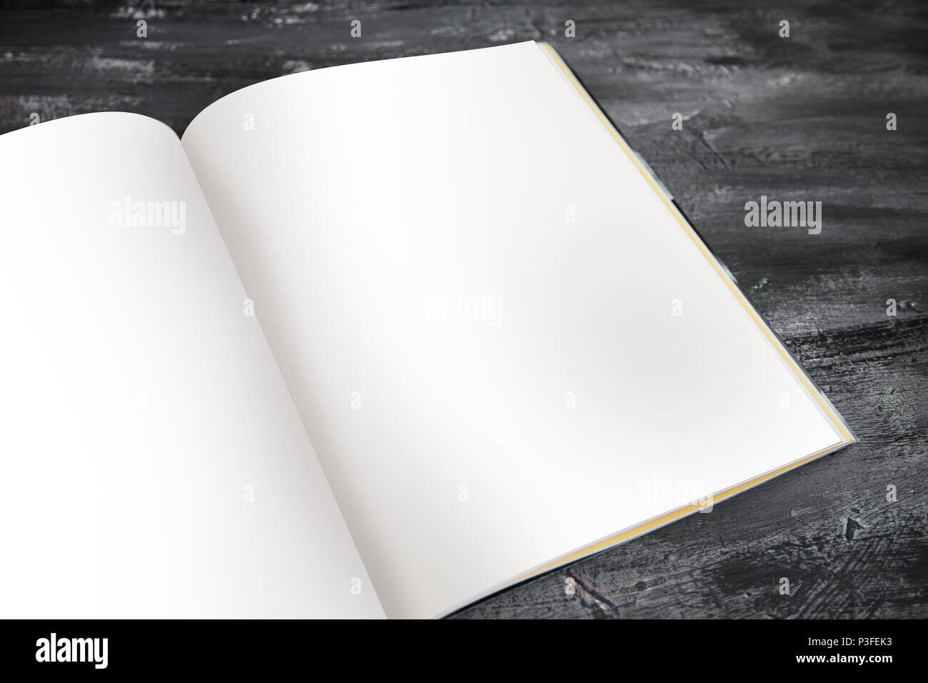 Eco vintage magazine with empty pages on black wood table background ...