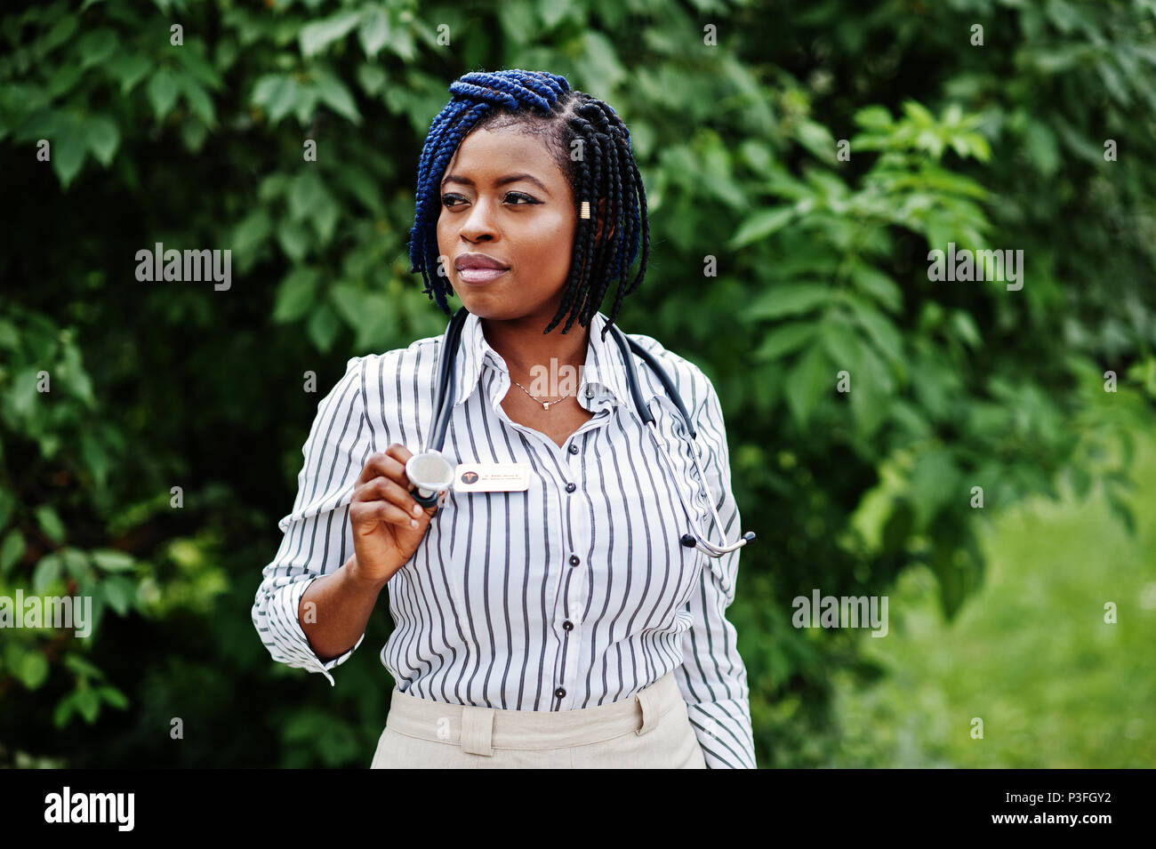 Stylish african american doctor with stethoscope posed outdoor Stock ...