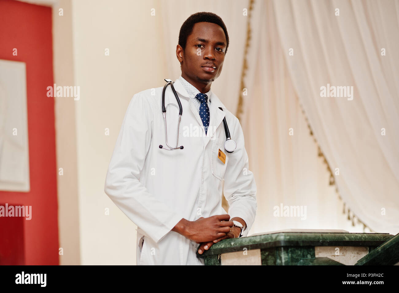 Stylish african american doctor with stethoscope posed indoor Stock ...
