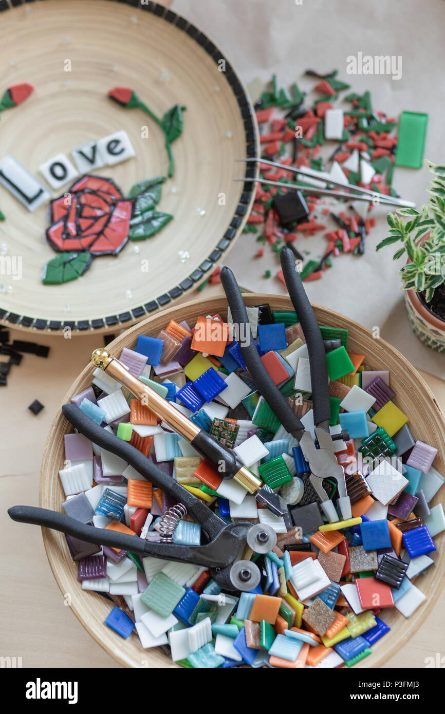 Workplace of the mosaic master: tools for mosaic details. Close-up ...