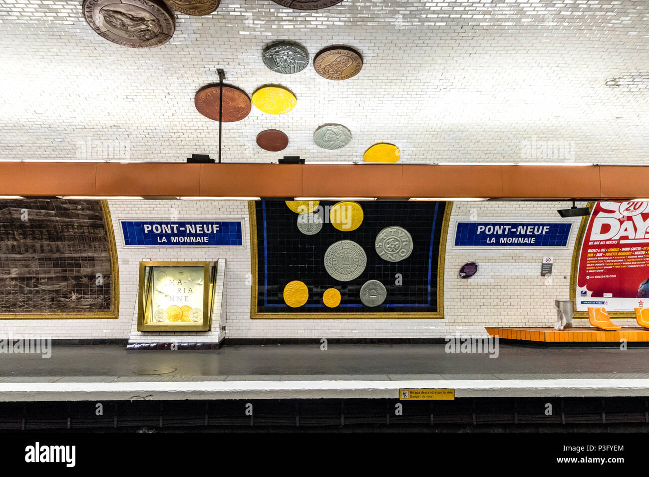 Pont Neuf station on The Paris Metro , decorated with huge coins on the ...