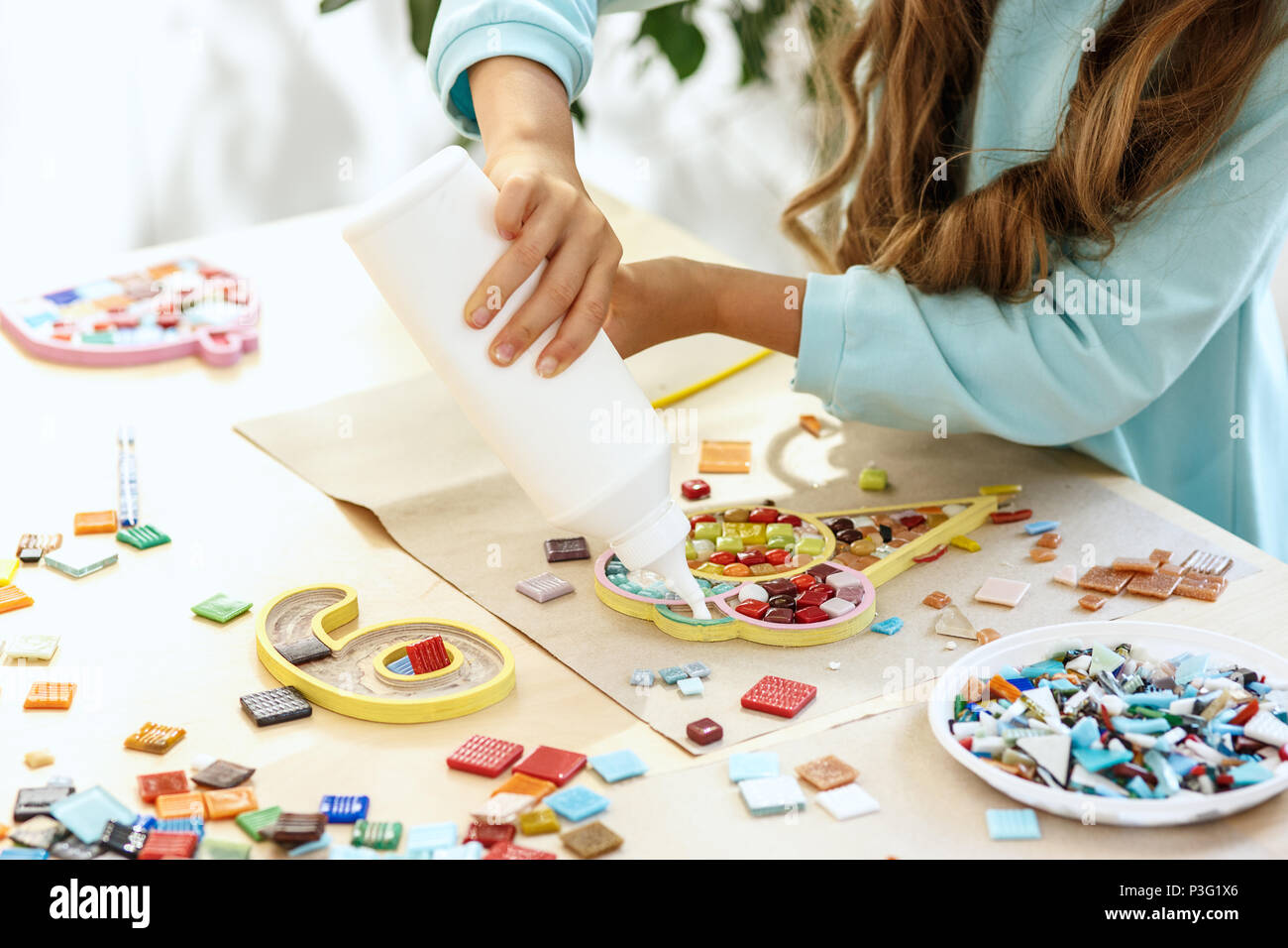 mosaic puzzle art for kids, children's creative game Stock Photo - Alamy